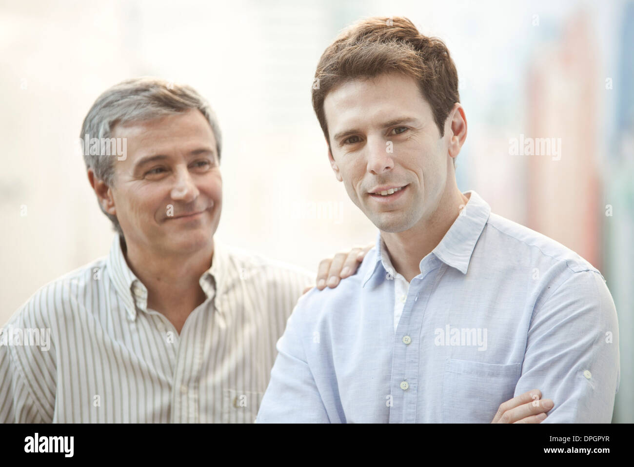 Adult son and father, portrait Stock Photo - Alamy