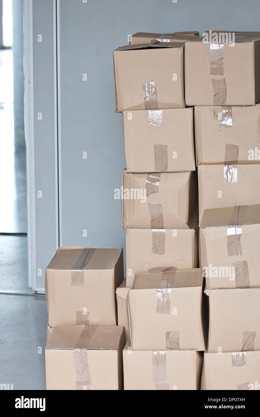 Stacked cardboard boxes Stock Photo - Alamy