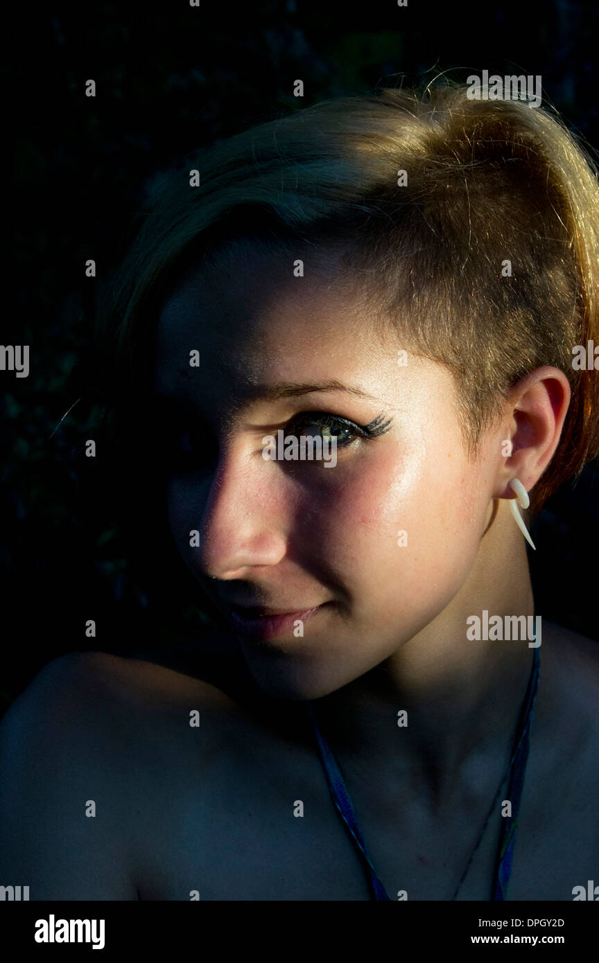 teenager in heavy shadows Stock Photo - Alamy