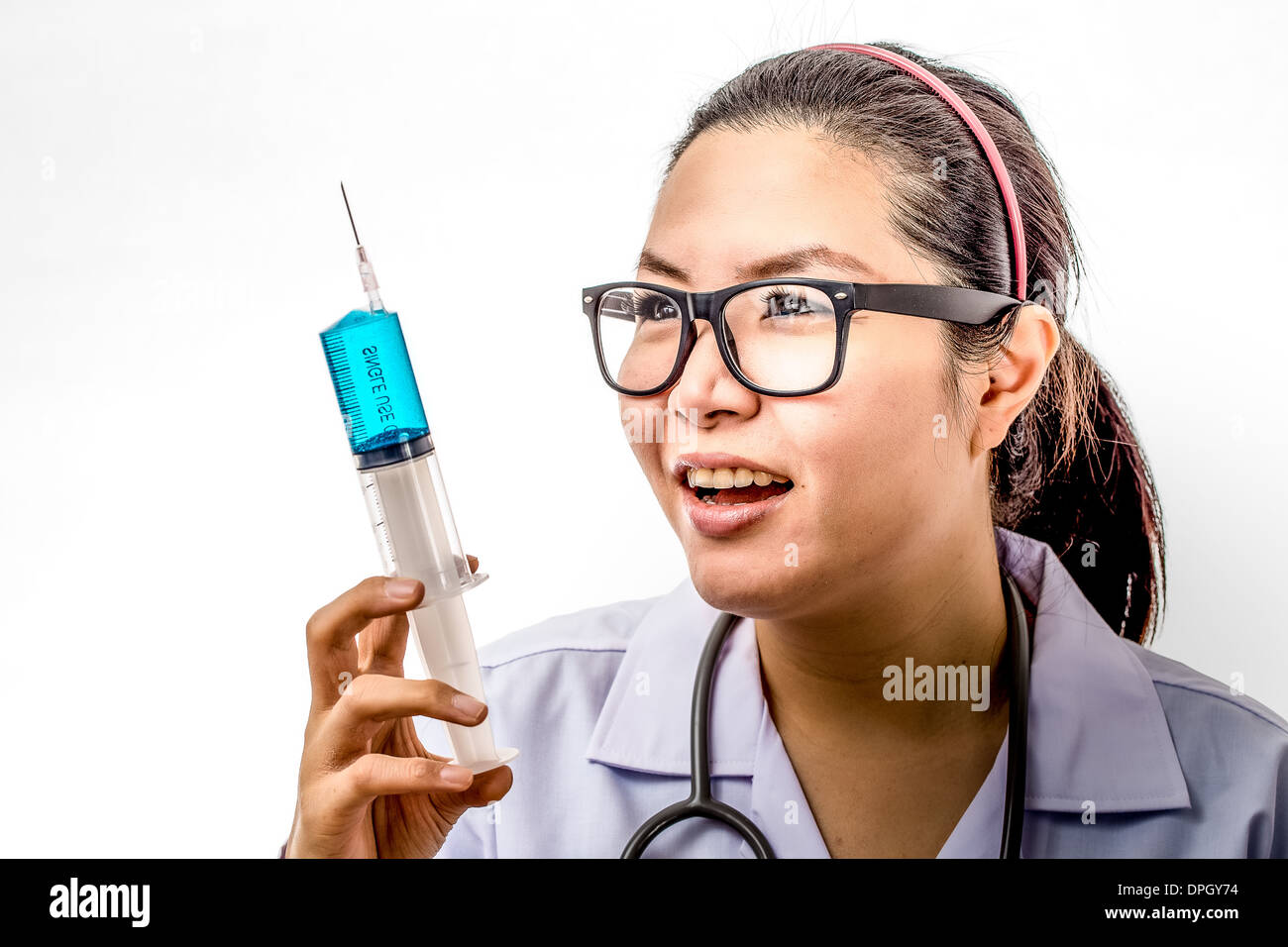 asian female doctor shooting in studio Stock Photo - Alamy