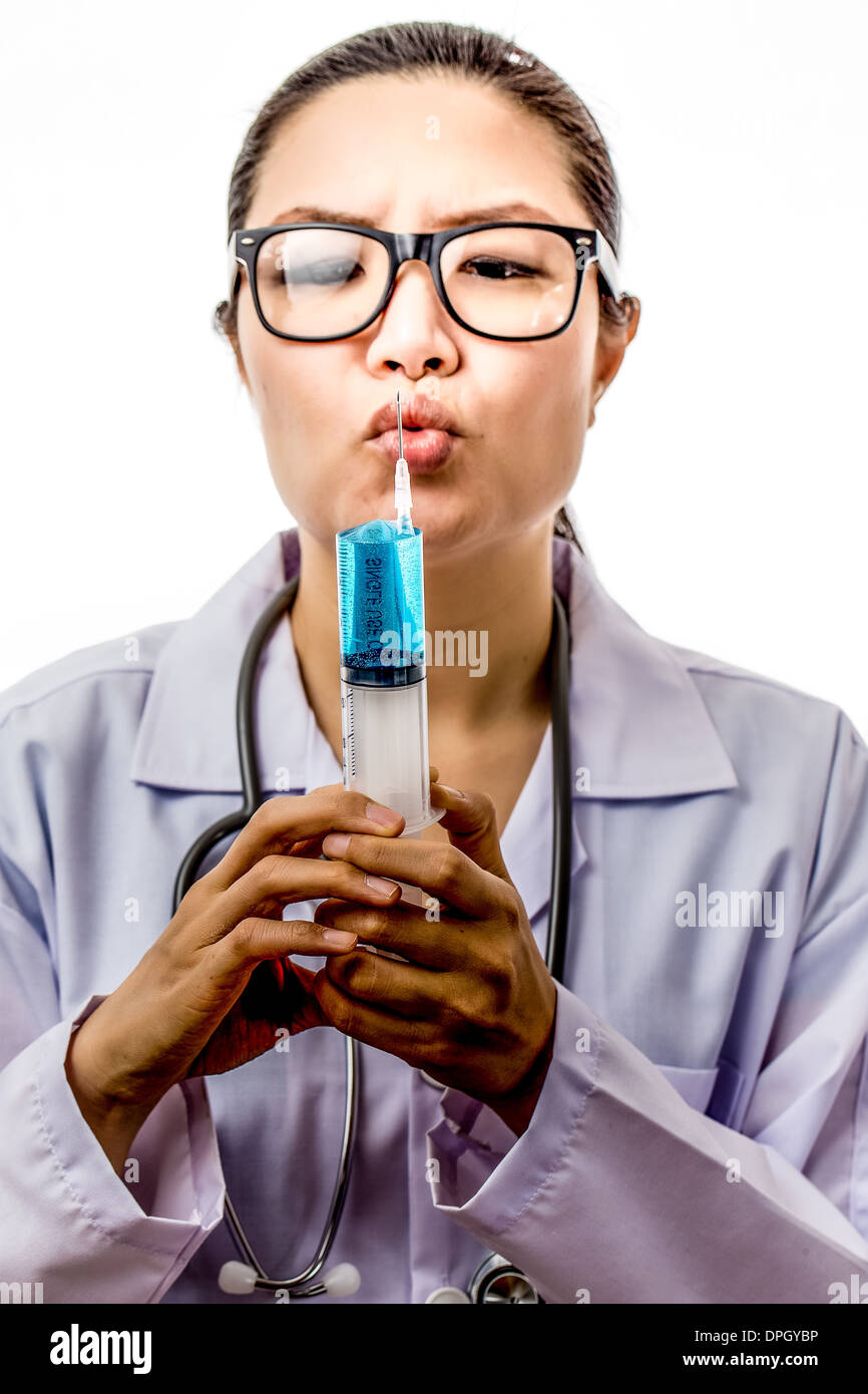 asian female doctor shooting in studio Stock Photo - Alamy