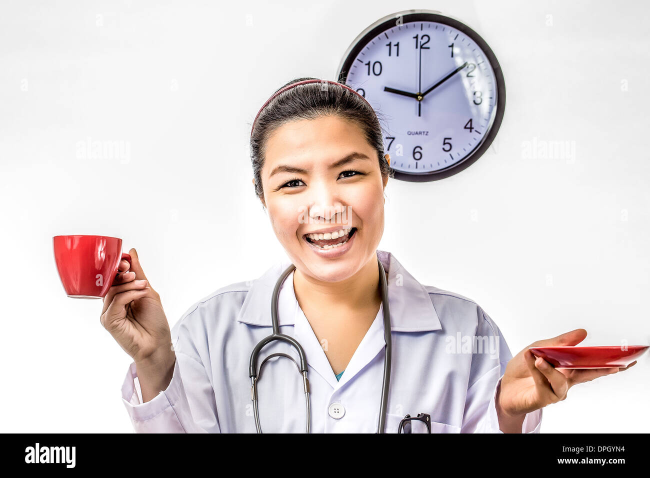asian female doctor shooting in studio Stock Photo - Alamy