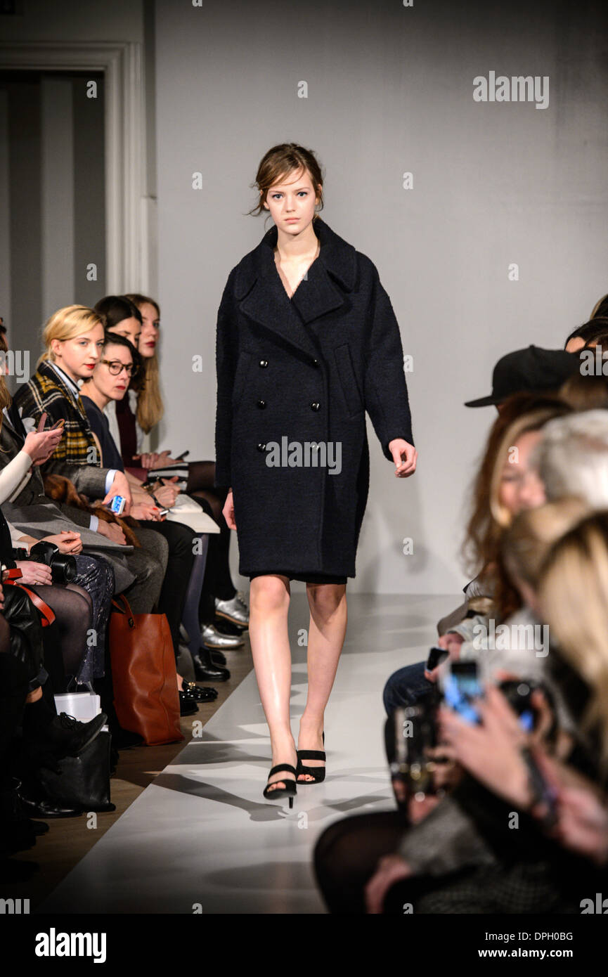 Berlin, Germany. 14th Jan, 2014. A model presents a creation at the ...