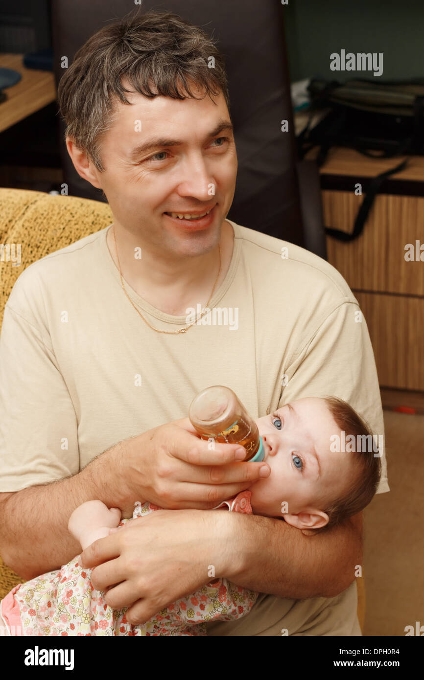 Baby and man hi-res stock photography and images - Alamy