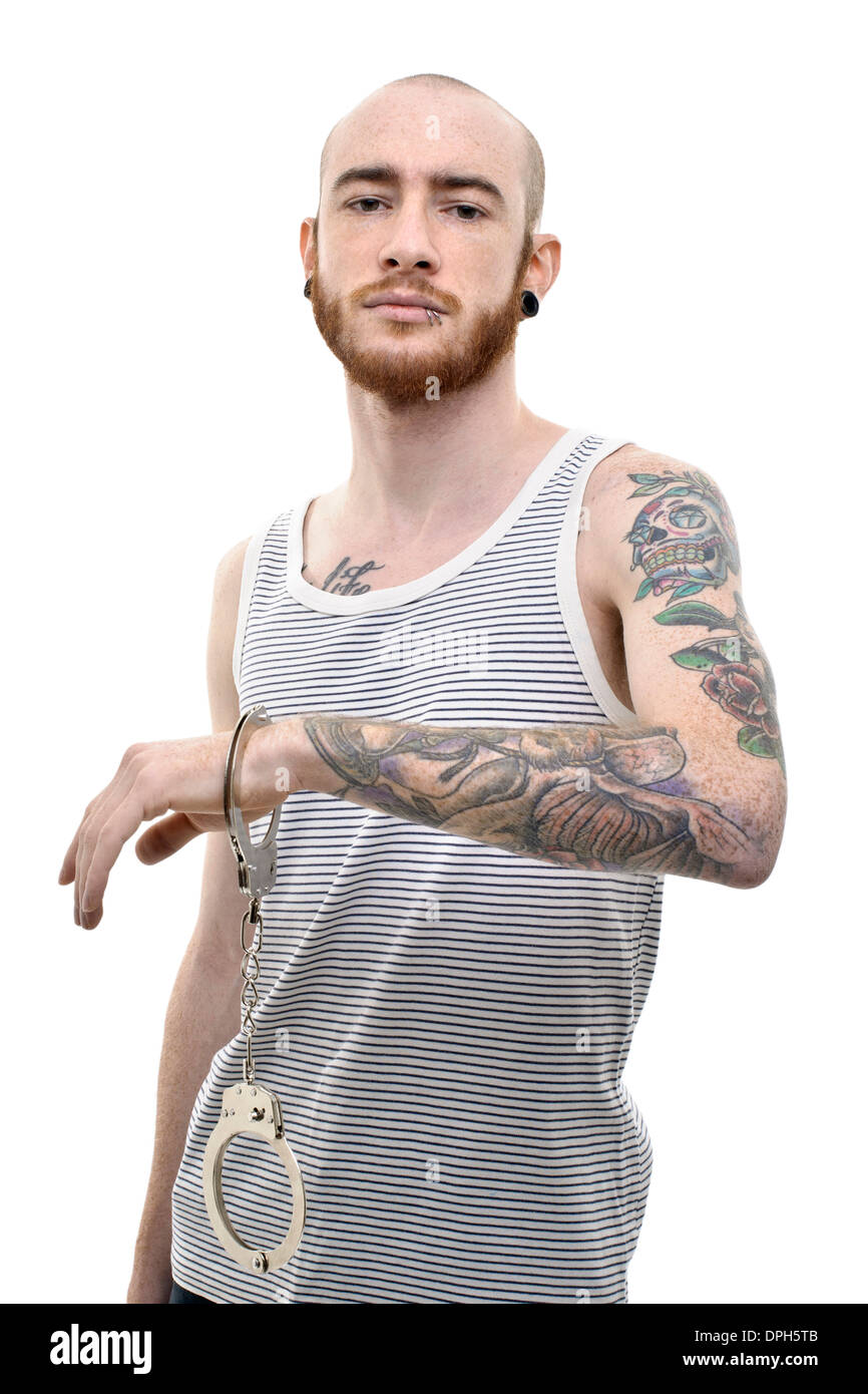 Young man in handcuffs Stock Photo - Alamy