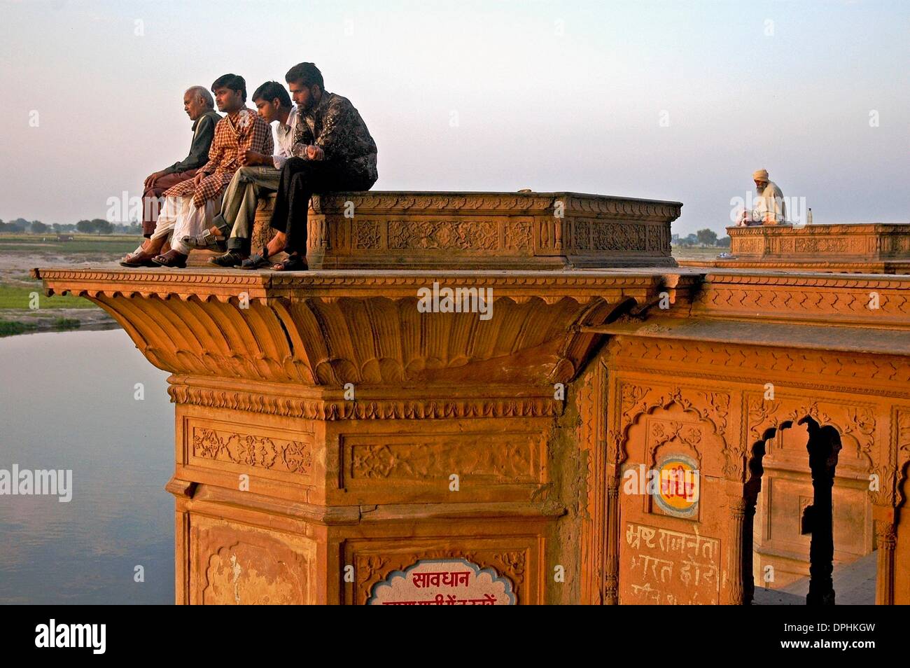 Mar 13, 2006 - Vrindavan, Uttar Pradesh, India - People sit on a ...