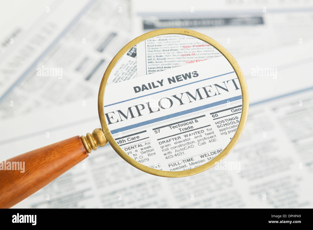 Newspaper magnifying glass hi-res stock photography and images - Alamy