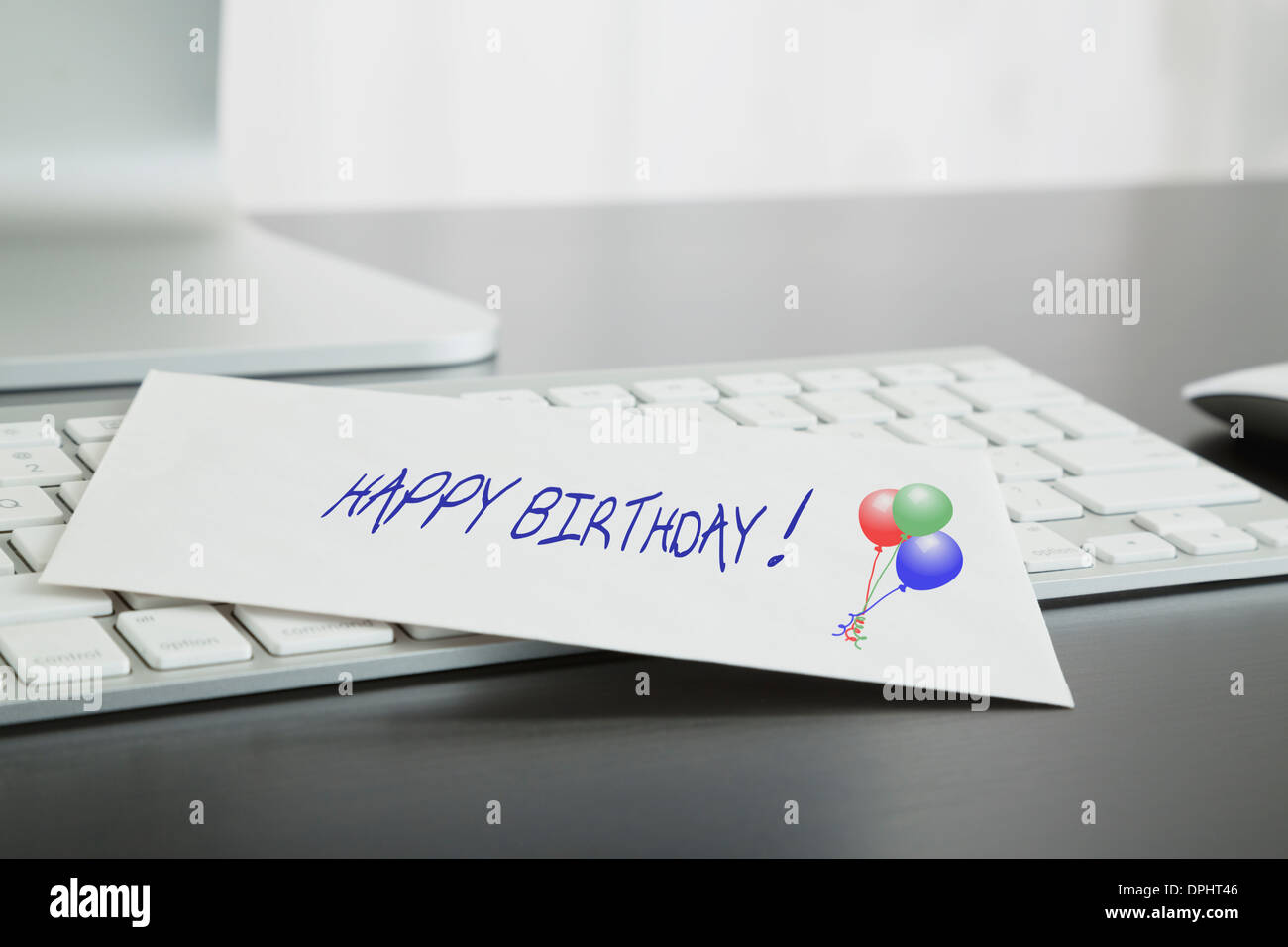 Close-up of birthday card on keyboard Stock Photo - Alamy