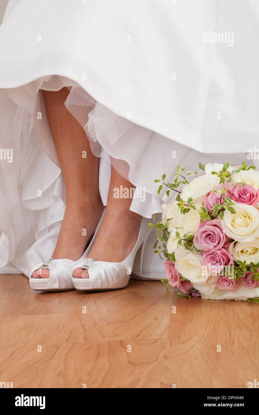 Low section of bride Stock Photo - Alamy