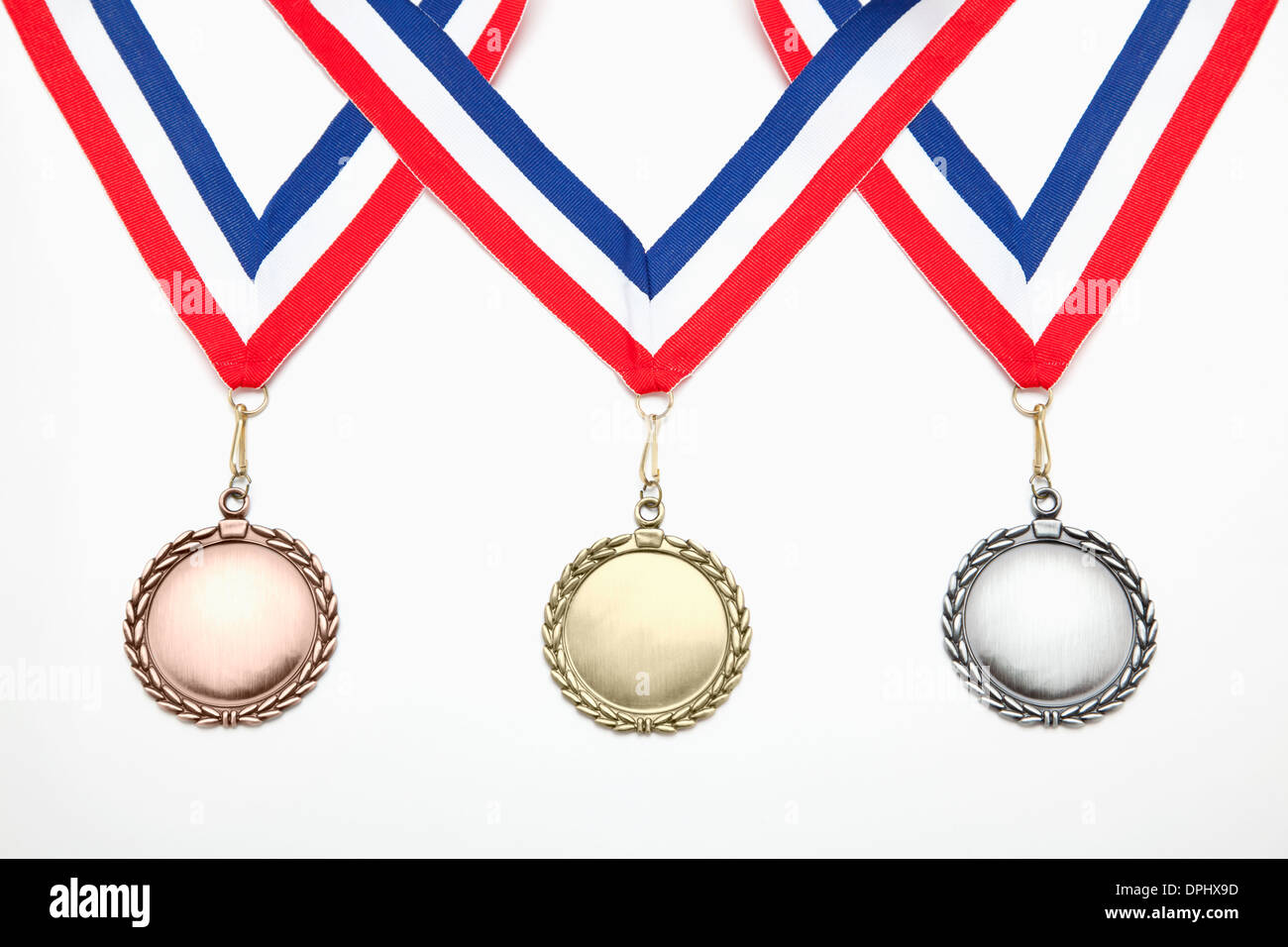 Studio shot of three medals Stock Photo - Alamy