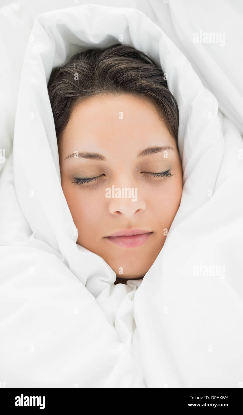 Woman sleeping wrapped up in hi-res stock photography and images - Alamy