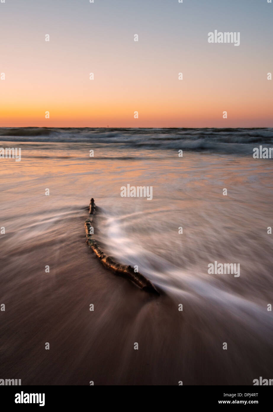 sunset on beach landscape Stock Photo - Alamy
