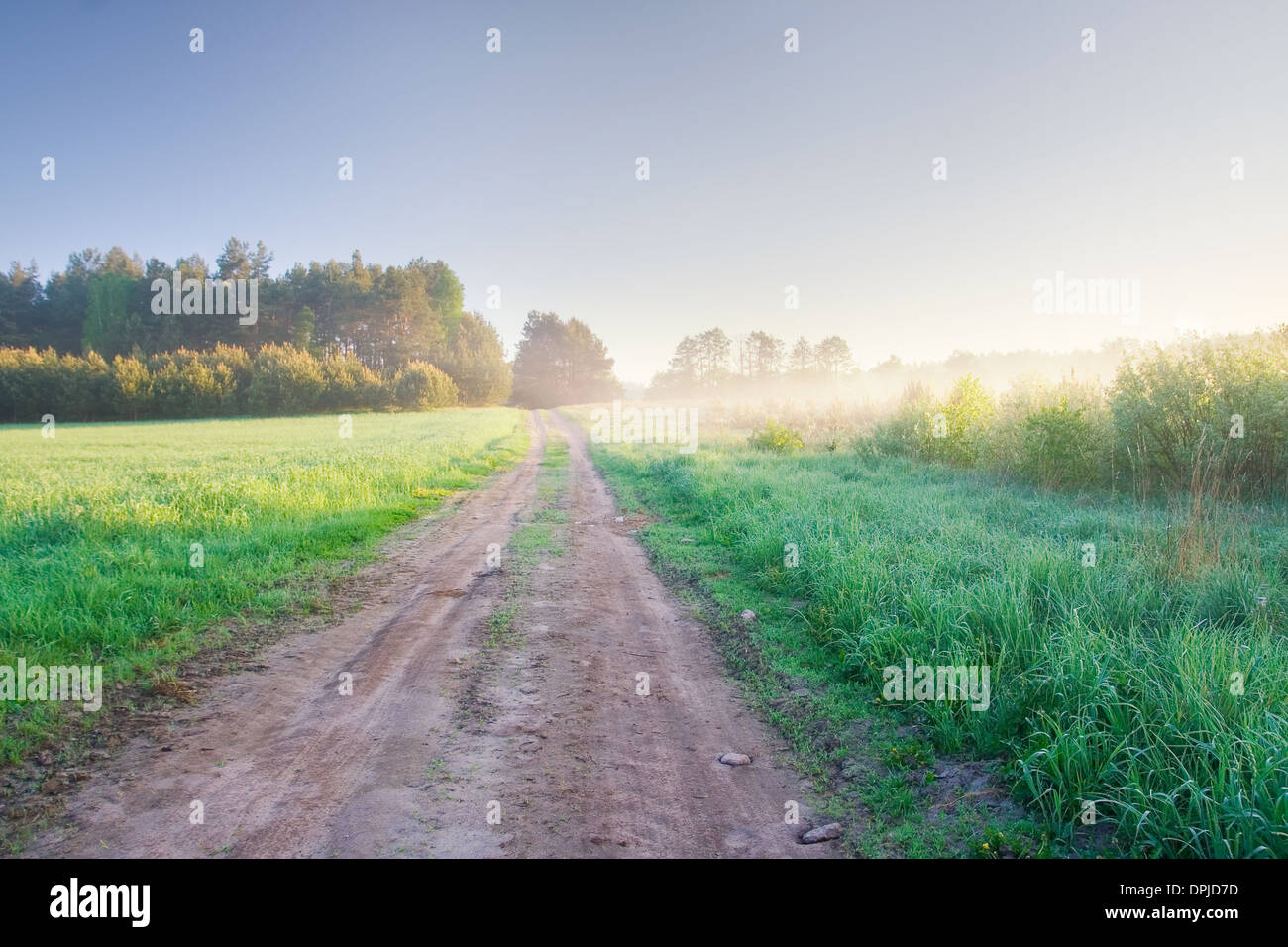 rural sandy road at sunrise Stock Photo - Alamy