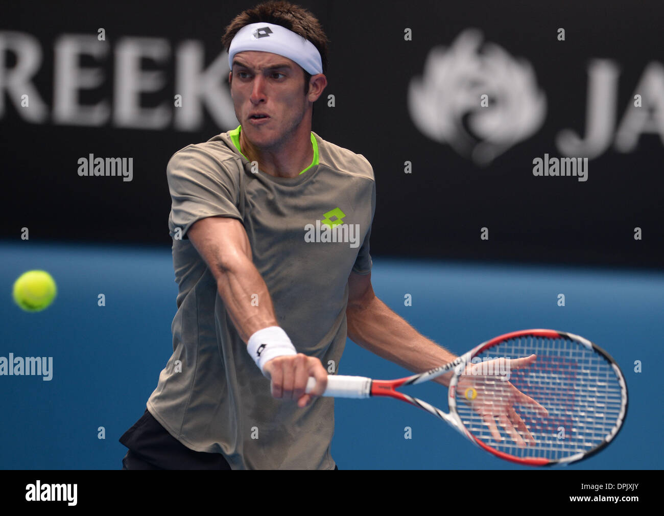Melbourne, Australia. 15th Jan, 2014. Leonardo Mayer of Argentina hits ...