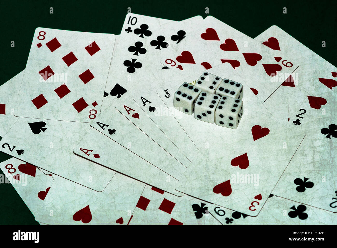 Good Luck To You 3. Closeup view of playing cards and five dices with ...