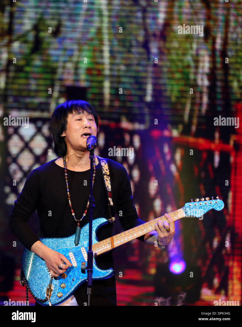 Beijing, China. 15th Jan, 2014. Singer Chang Kuan performs during a ...