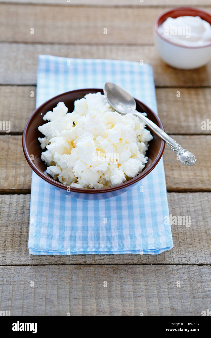 fresh curd cheese and sour cream in a bowl, food closeup Stock Photo ...