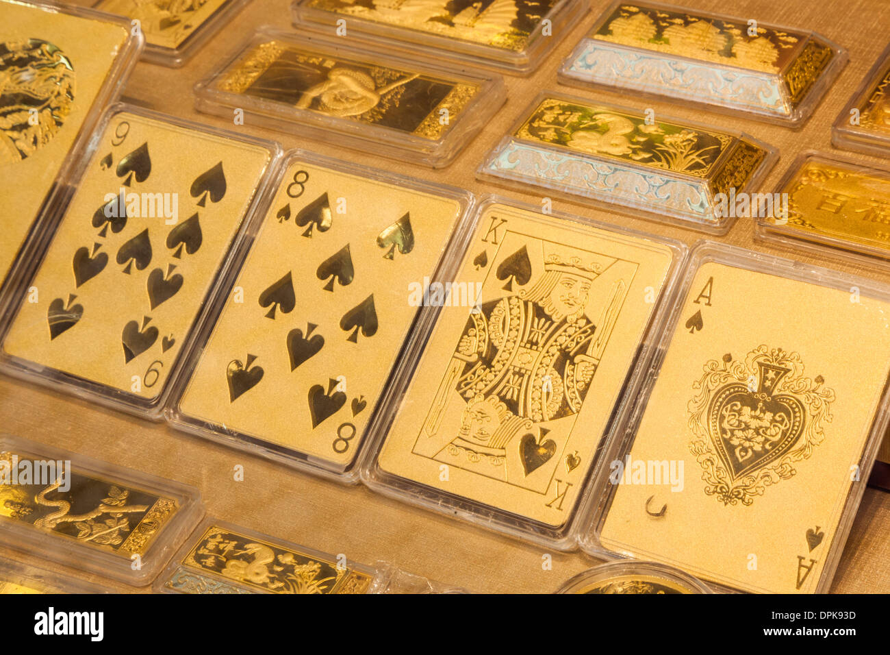 China, Macau, Gold and Jewellery Shop Window, Display of Gold Playing ...