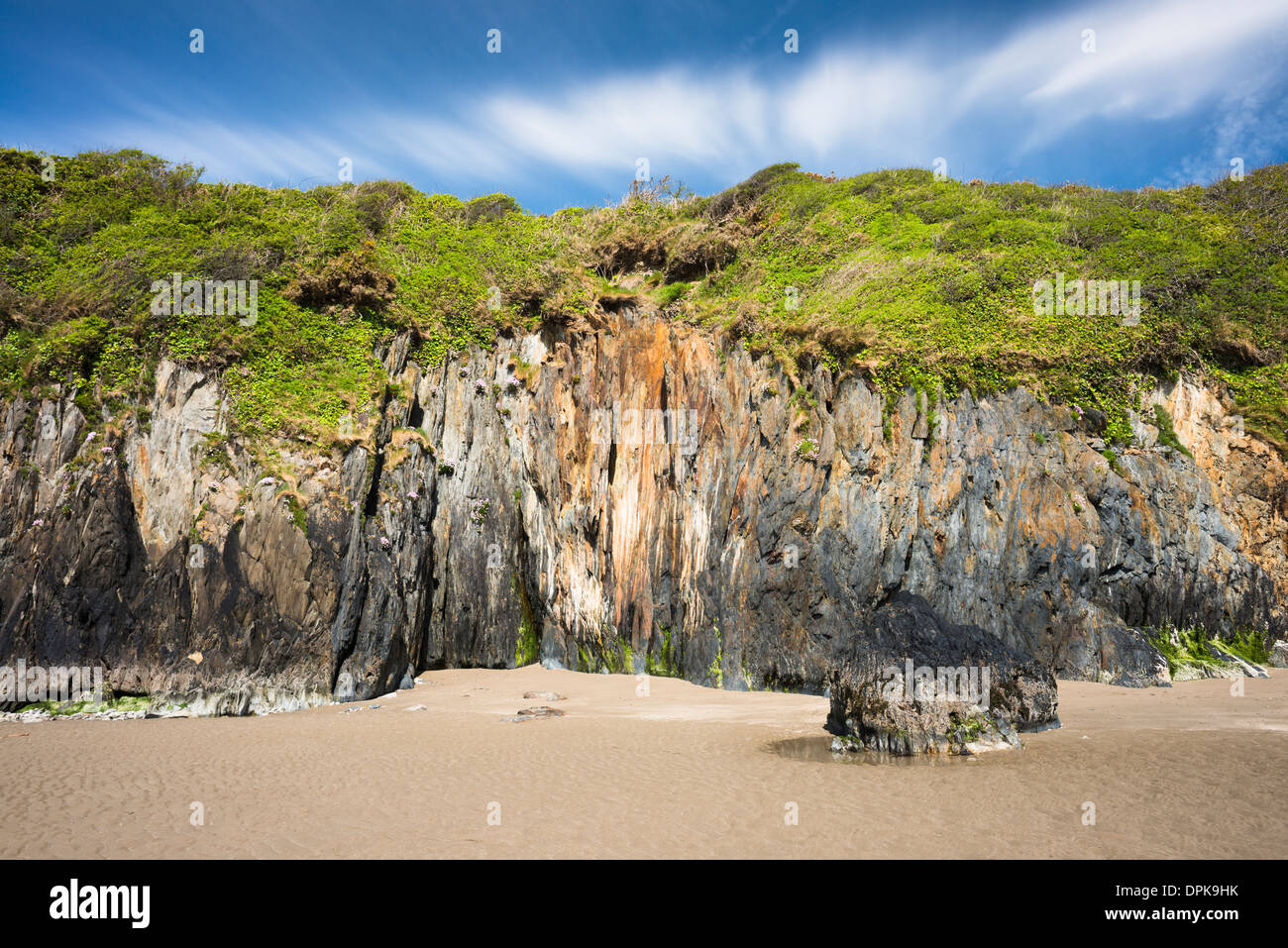 Small rocky cliffs of Ordovician marine sediments at Stradbally Cove ...