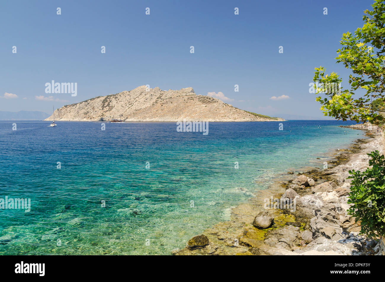 Dry limestone Islet of Moni off the town of Perdika, Aegina Island ...