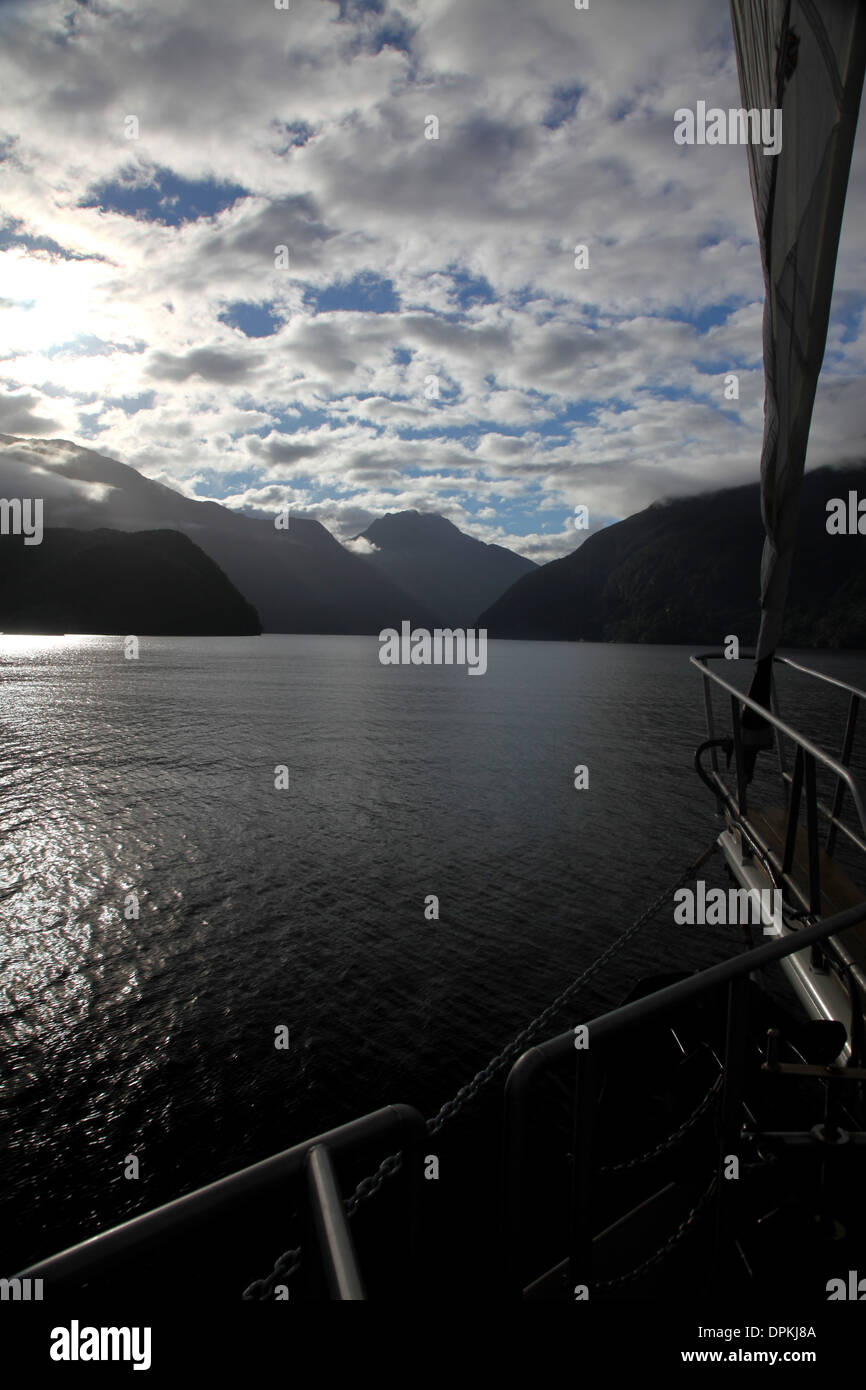 Early sunlight illuminates the path to Doubtful Sound Stock Photo - Alamy