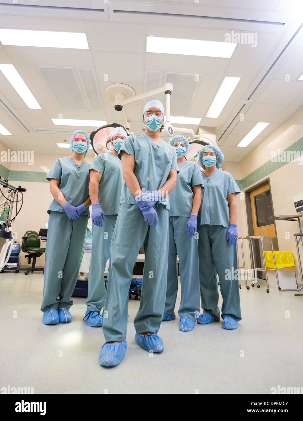 Medical Team In Scrubs Standing Inside Operation Room Stock Photo - Alamy