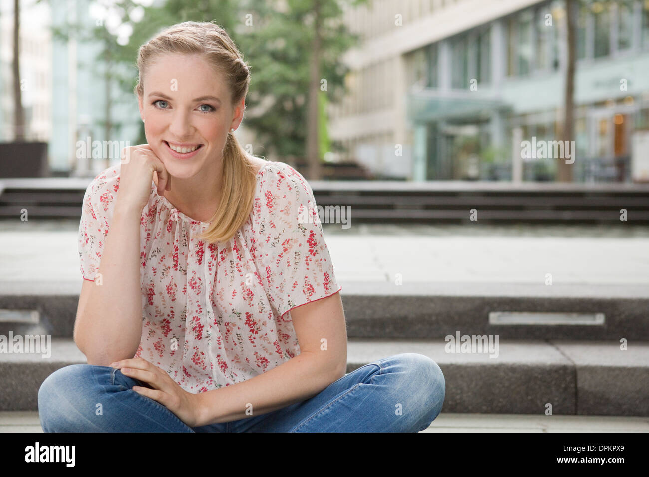 Young Woman Sitting On Stairs Stock Photos & Young Woman Sitting On ...