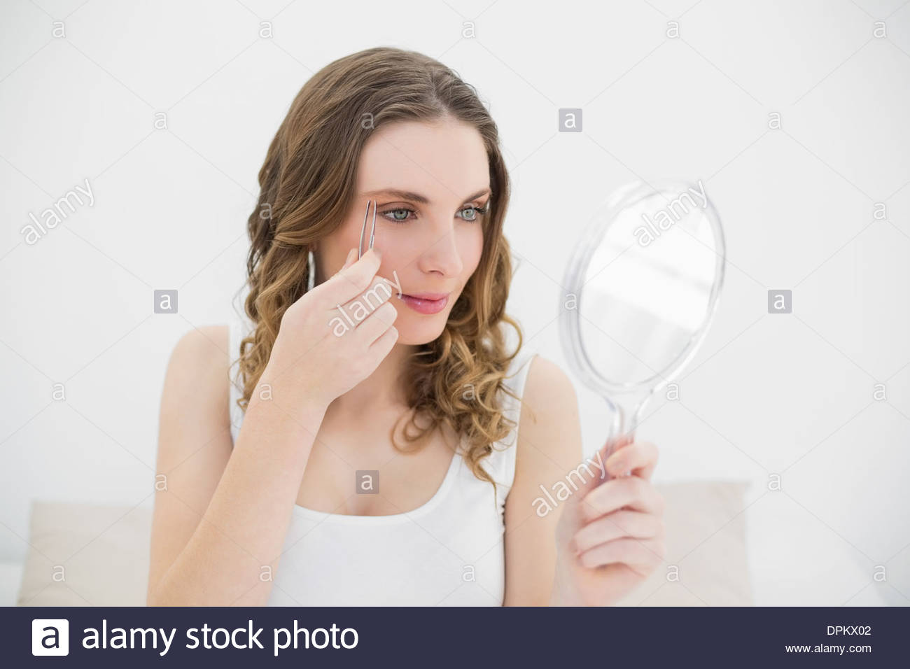 Plucking tool hi-res stock photography and images - Alamy