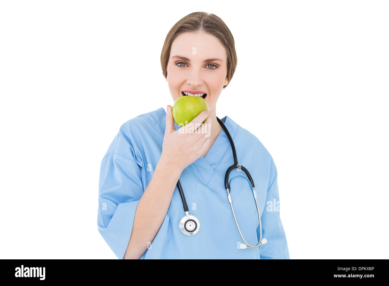 Female doctor eating an apple Stock Photo - Alamy