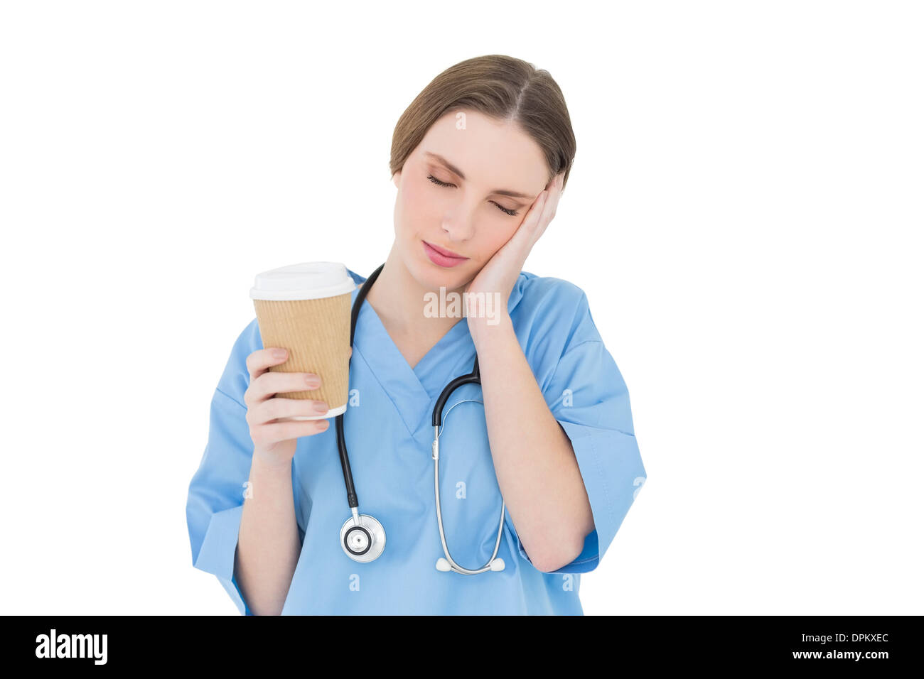 Doctor tired blue scrubs hi-res stock photography and images - Alamy