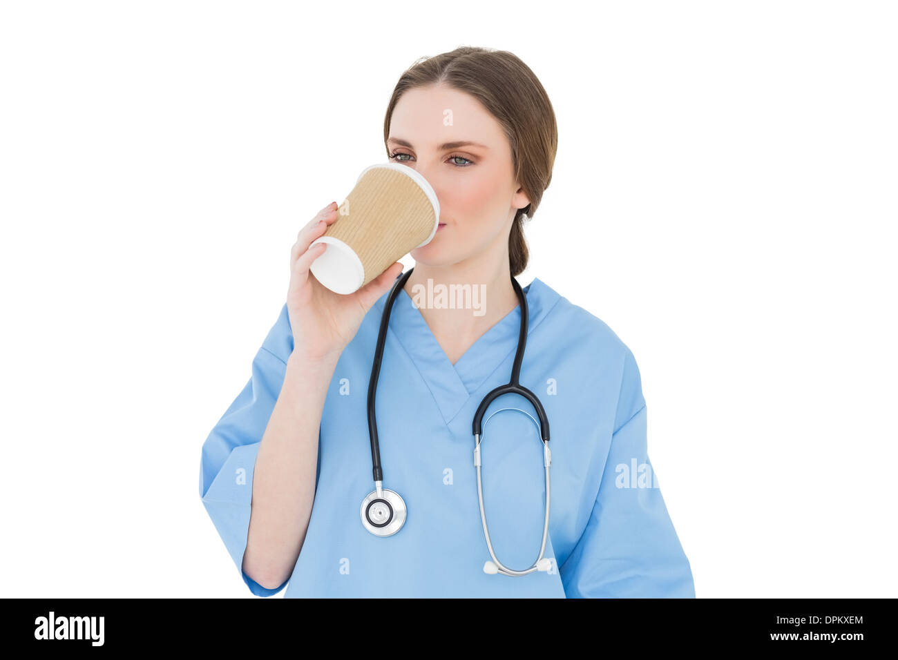 Female doctor drinking coffee Stock Photo - Alamy
