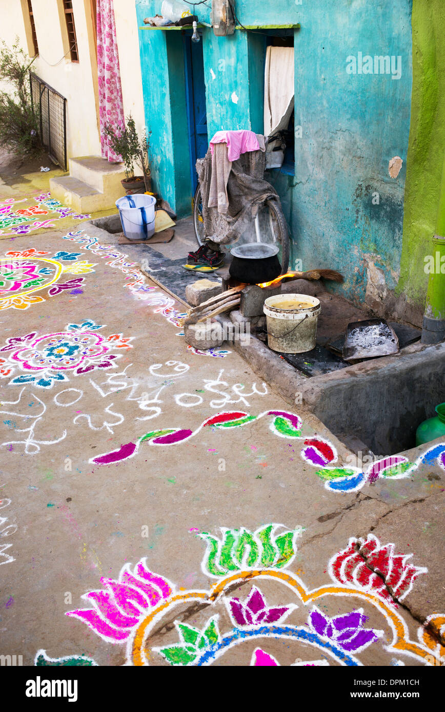 Rural Indian village street covered with Rangoli festival coloured ...