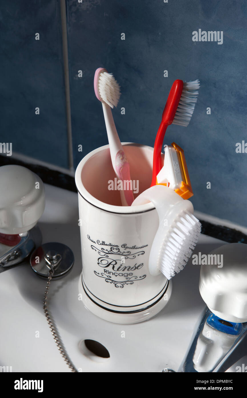 bathroom toothbrush container Stock Photo - Alamy