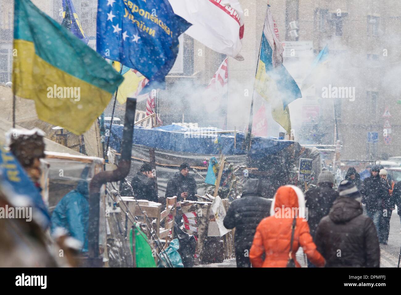 Kiev, Ukraine. 13th Jan, 2014. Protesters from Euromaidan face the ...