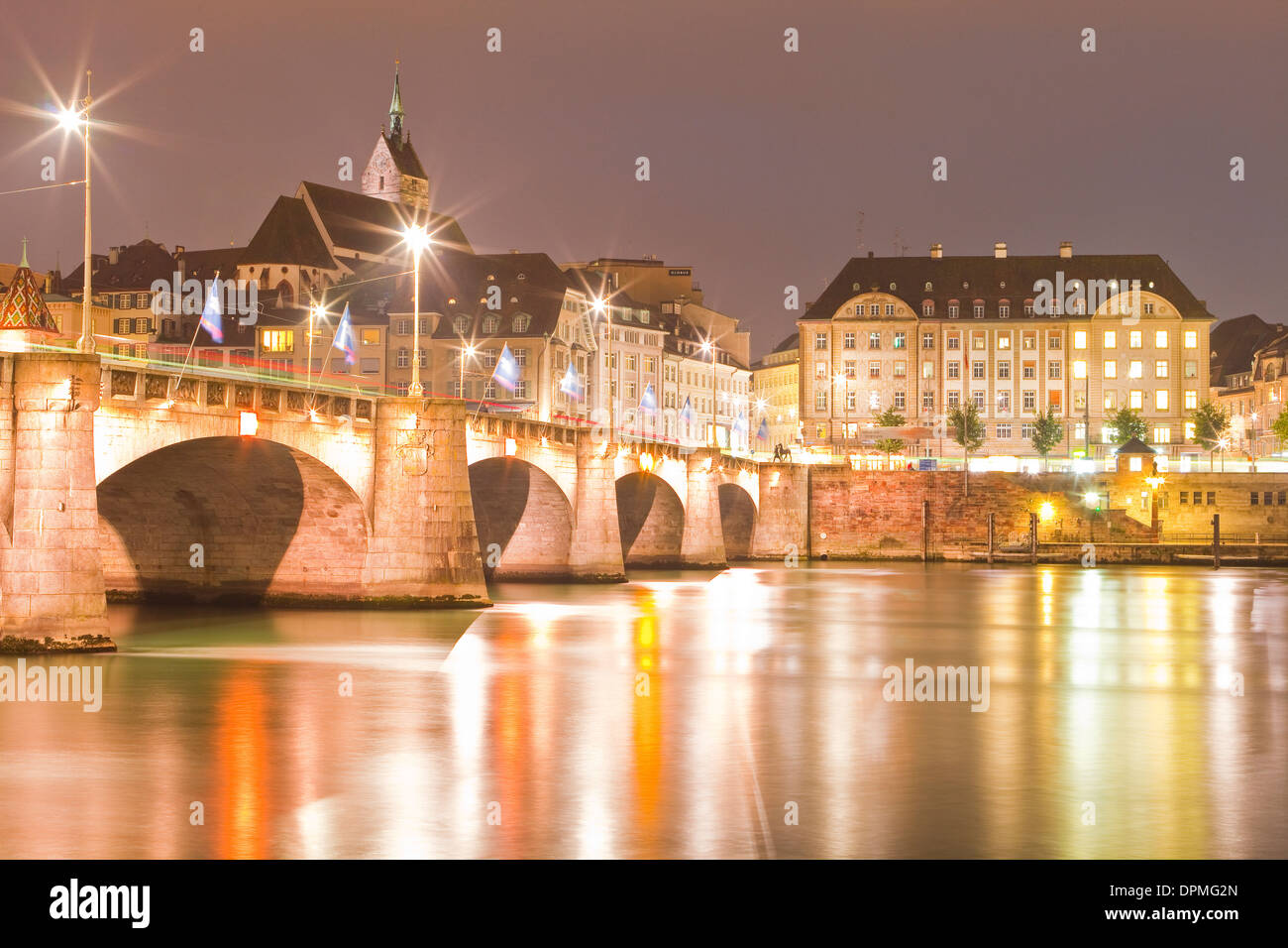 The city of Basel lit up at night Stock Photo - Alamy