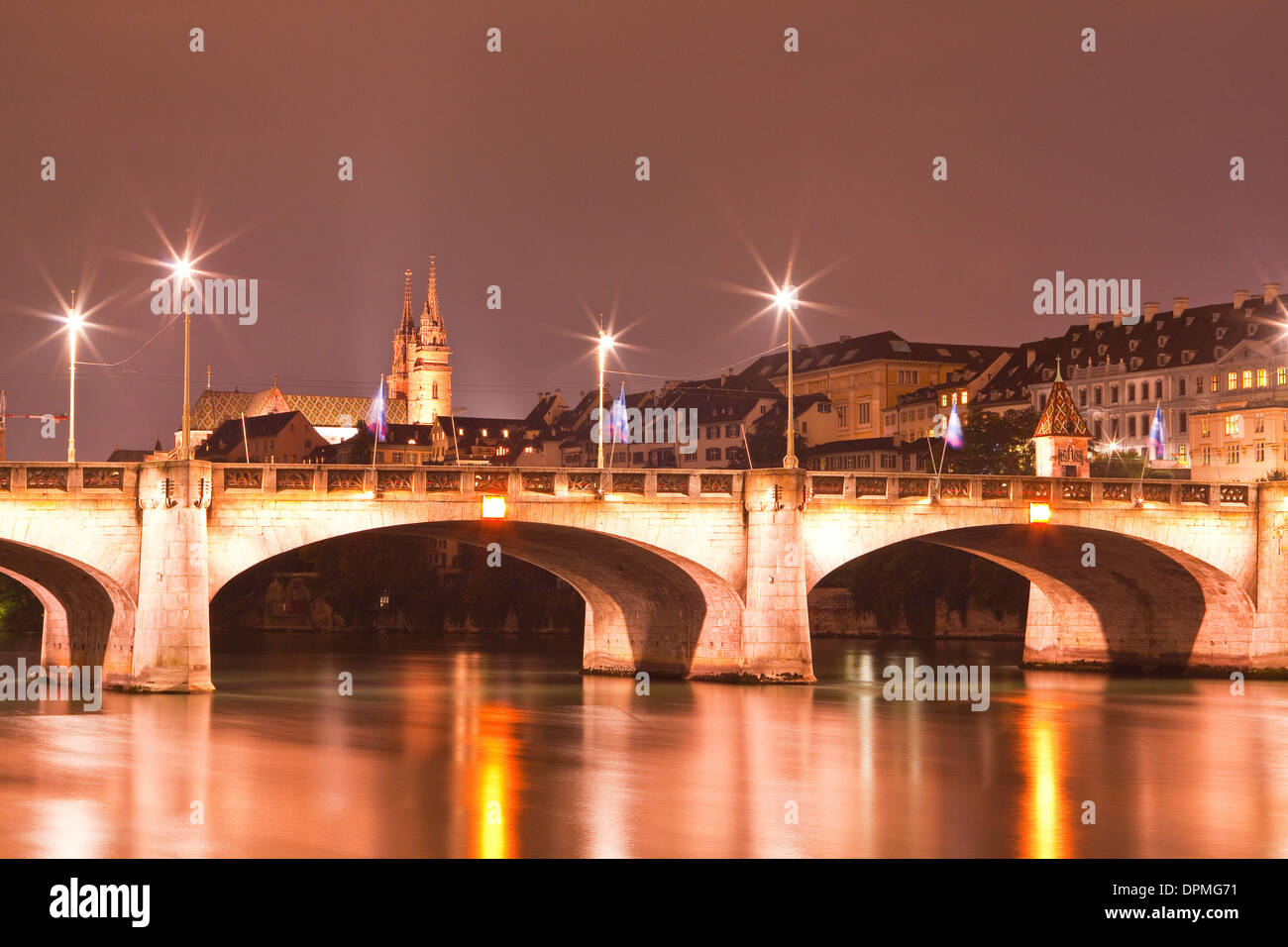 The city of Basel lit up at night Stock Photo - Alamy