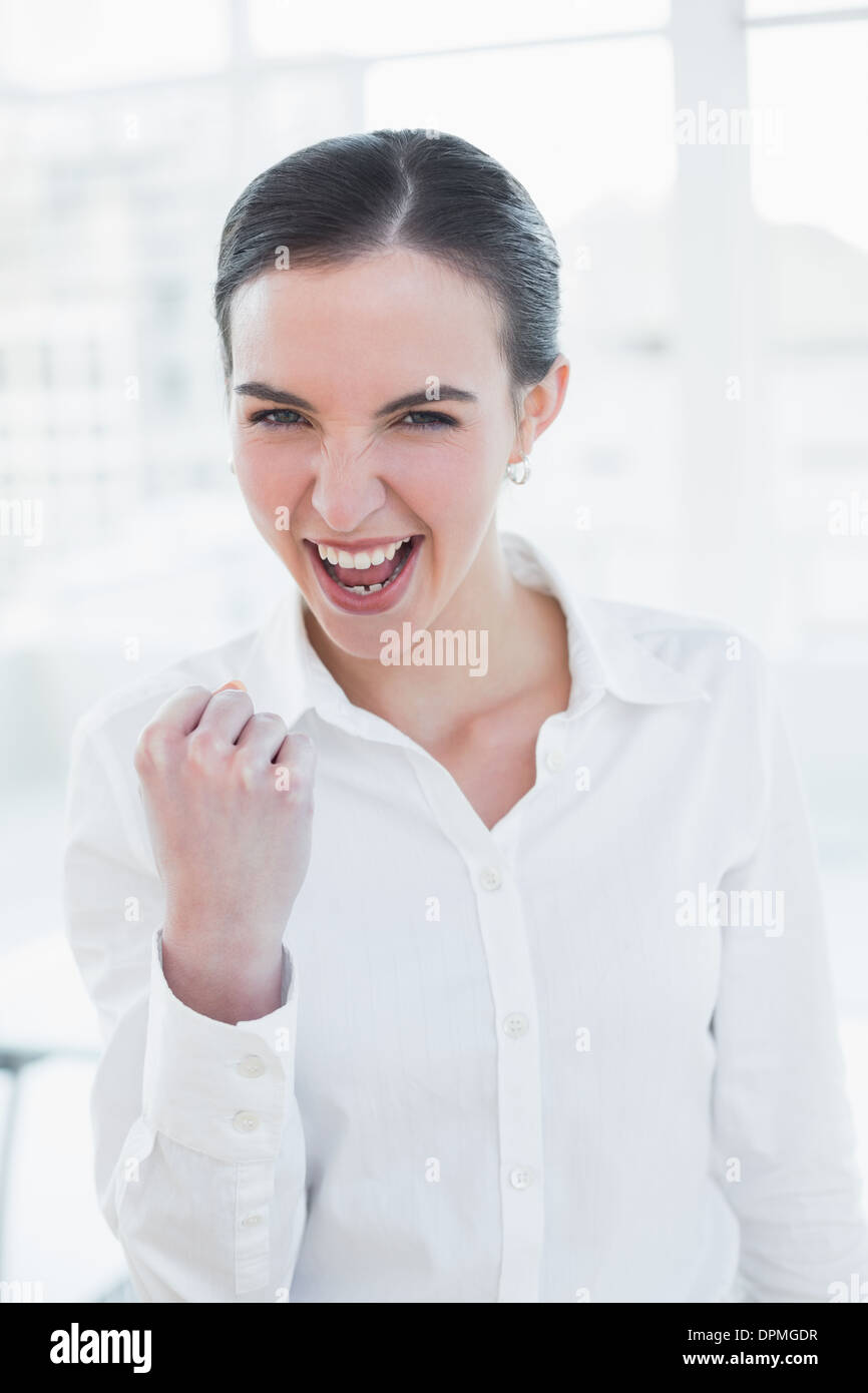 Cheerful female professional cheering hi-res stock photography and ...