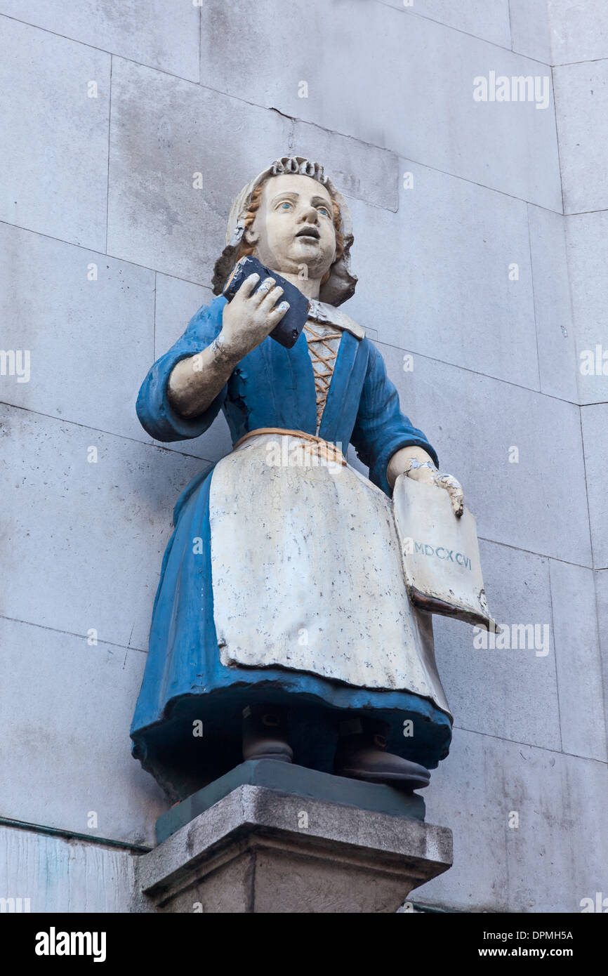 City of London, St Andrew Holborn One of two figures of charity school ...