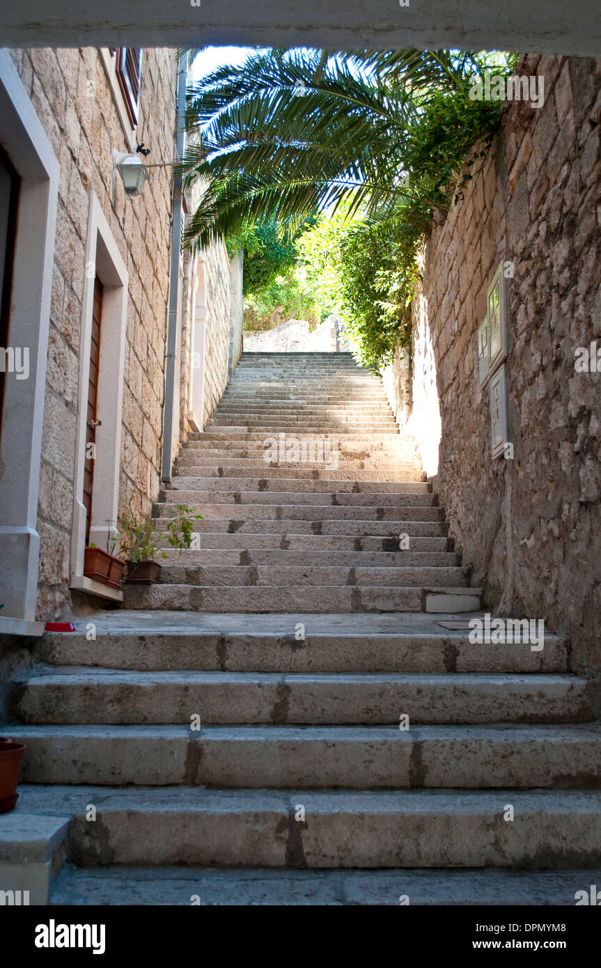 Steep street with steps, Korcula, Croatia Stock Photo - Alamy