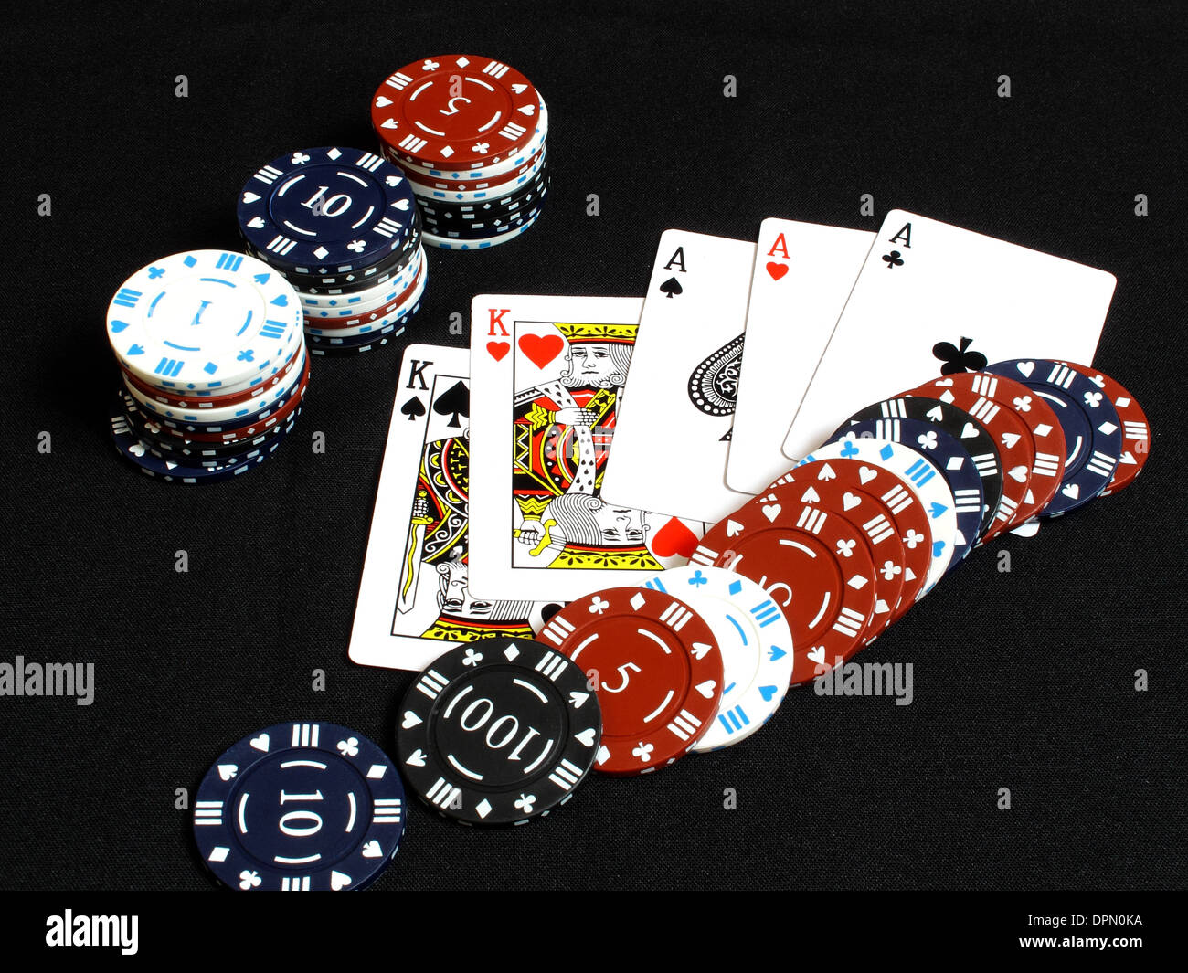 A full house of aces over kings surrounded by chips Stock Photo - Alamy