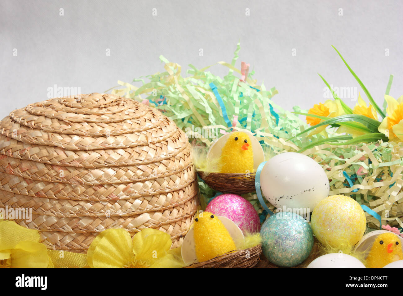 An image showing the concept of Easter with a straw bonnet surrounded ...