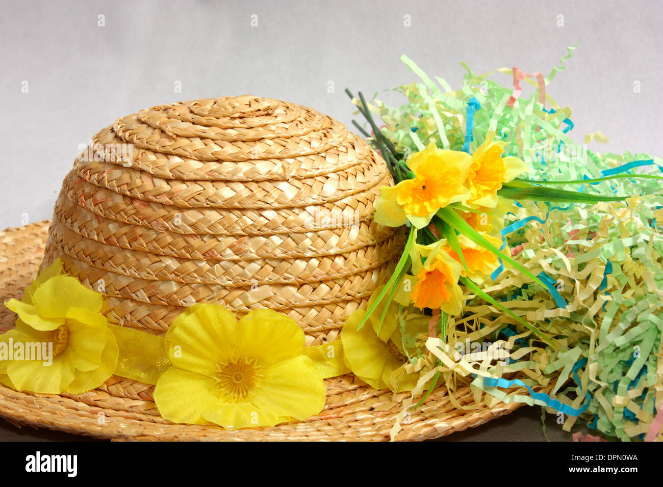 An image showing the concept of Easter with a straw bonnet surrounded ...