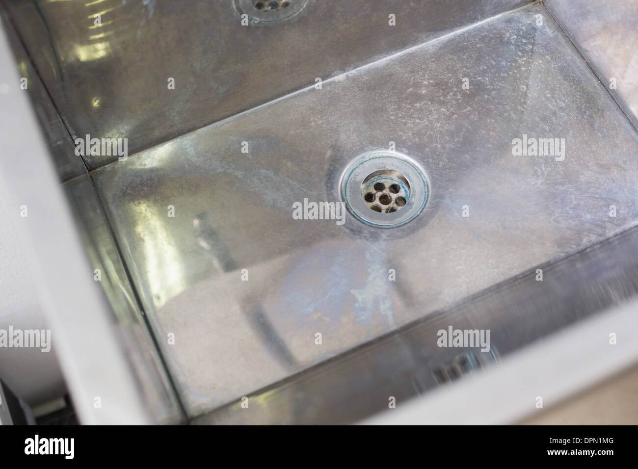Stainless steel kitchen sink and drain Stock Photo - Alamy