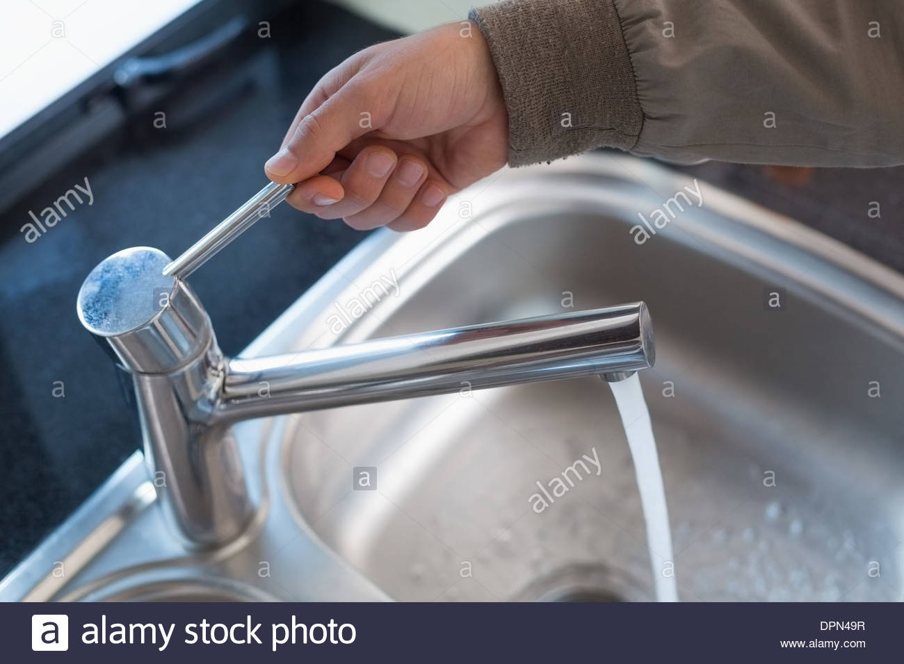 Opening faucet hi-res stock photography and images - Alamy