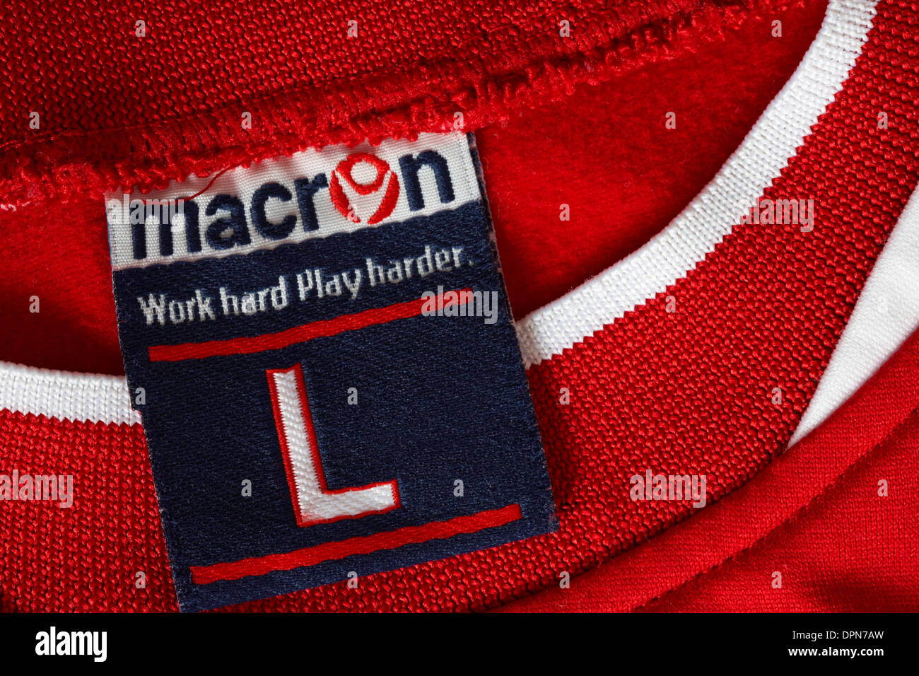 label in garment - Macron work hard play harder L Stock Photo - Alamy