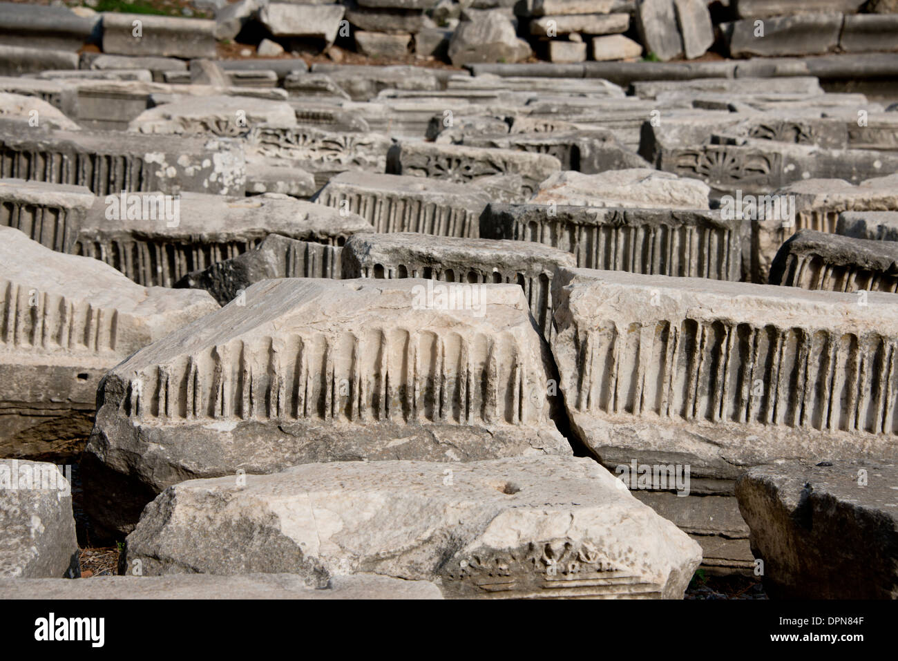 Turkey, Kusadasi, Ephesus. Detail of ornately carved marble rubble ...