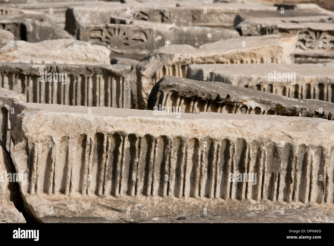 Turkey, Kusadasi, Ephesus. Detail of ornately carved marble rubble ...