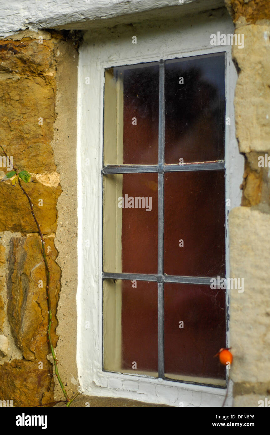 Lead Window of cottage in Rockingham Northptonshire Stock Photo - Alamy