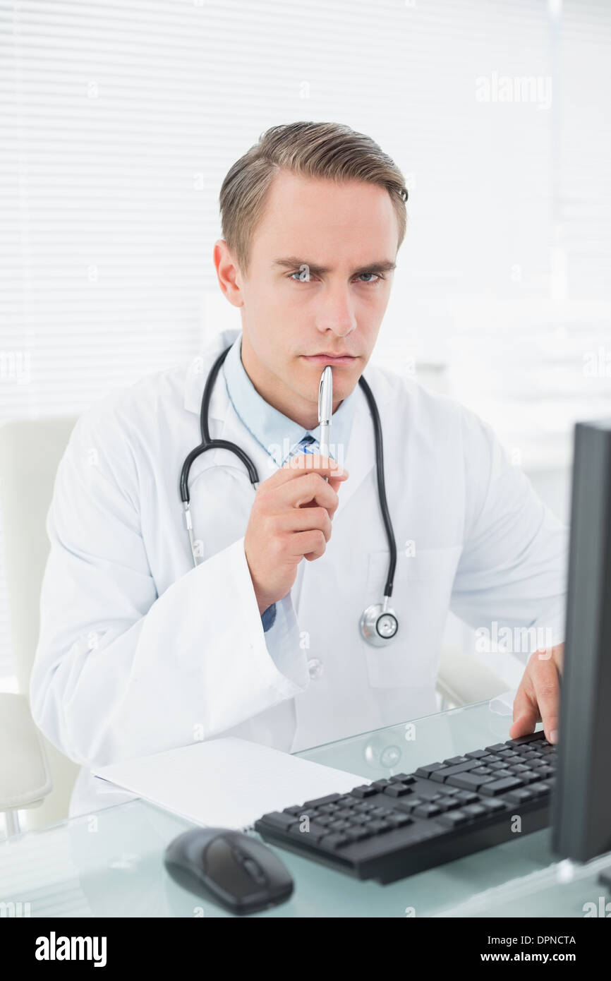 Young male using pc mouse hi-res stock photography and images - Alamy