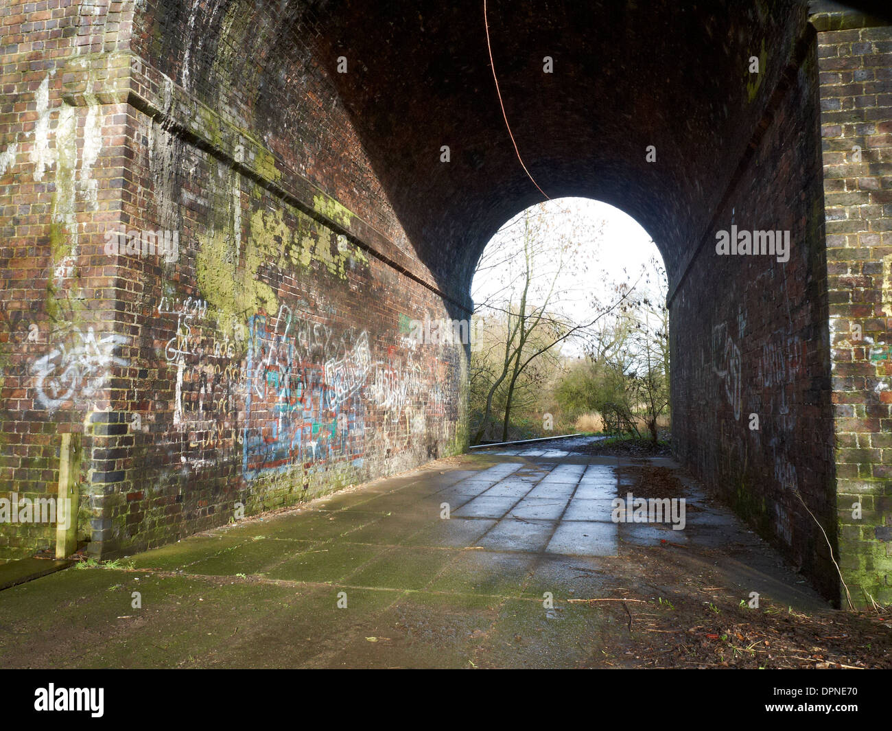Arch over former salt line railway, now public footpath in Cheshire UK ...